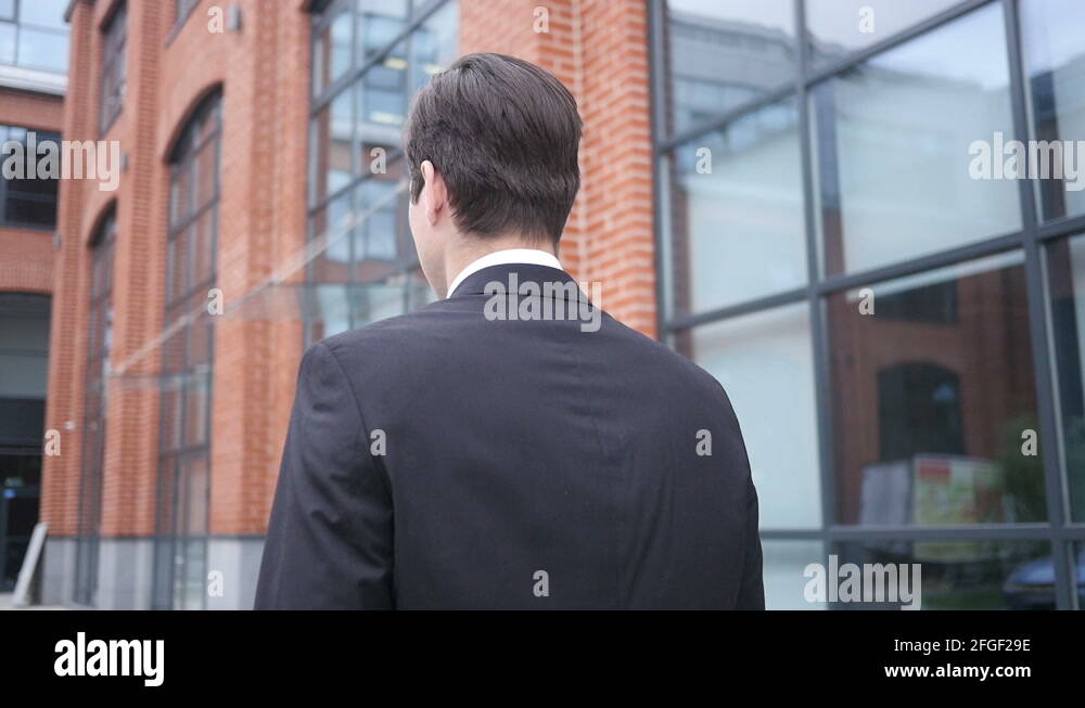 Close Up of Walking Man in Suit, Back View Stock Video Footage - Alamy