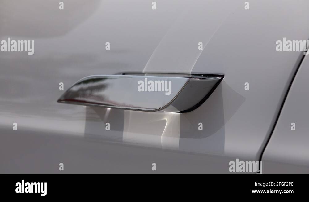 CLOSE UP: Tesla ecological electric car door opening system and handle ...