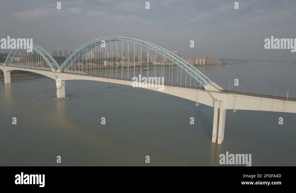 China infrastructure, high speed train rides over Yangtze river bridge ...