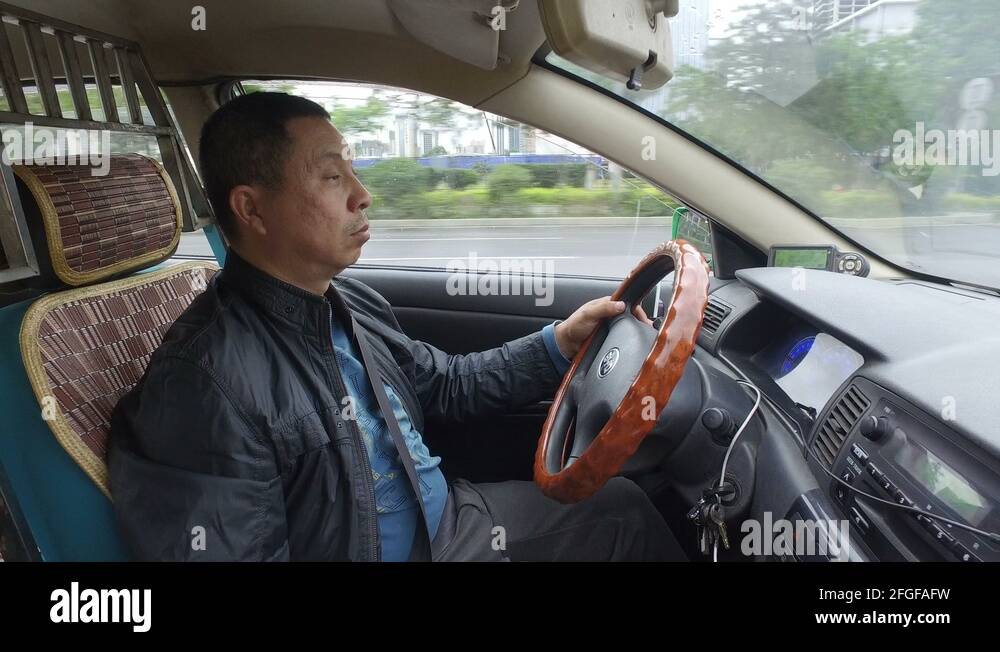 China taxi driver Stock Videos & Footage - HD and 4K Video Clips - Alamy