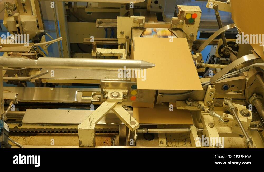 Folding cardboard boxes on a conveyor belt in a rice factory – 4K Stock ...