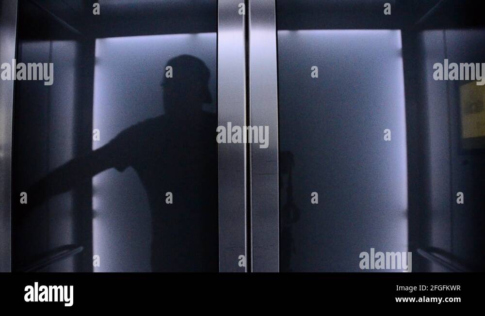 Elevator doors opening and closing Stock Video Footage - Alamy