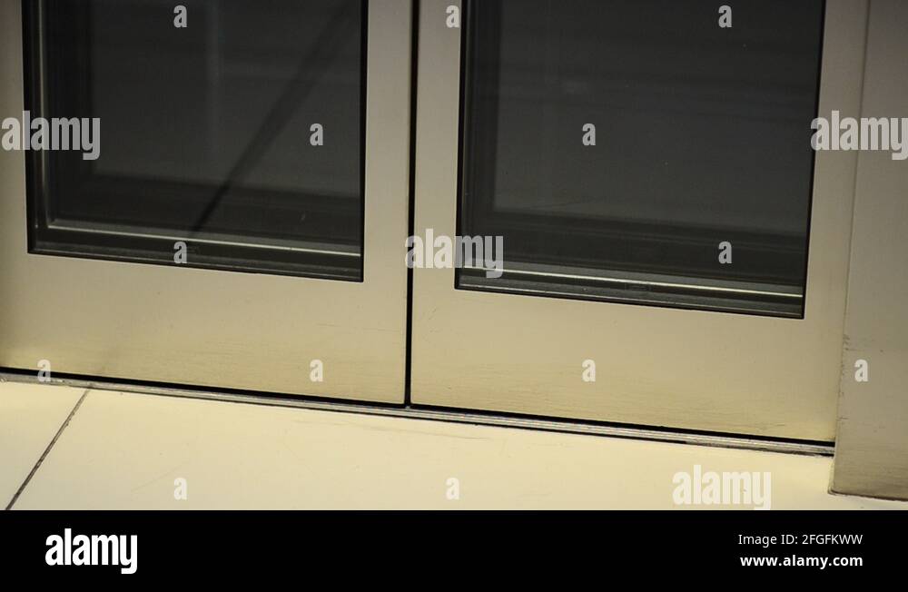 Elevator doors opening and closing Stock Video Footage - Alamy