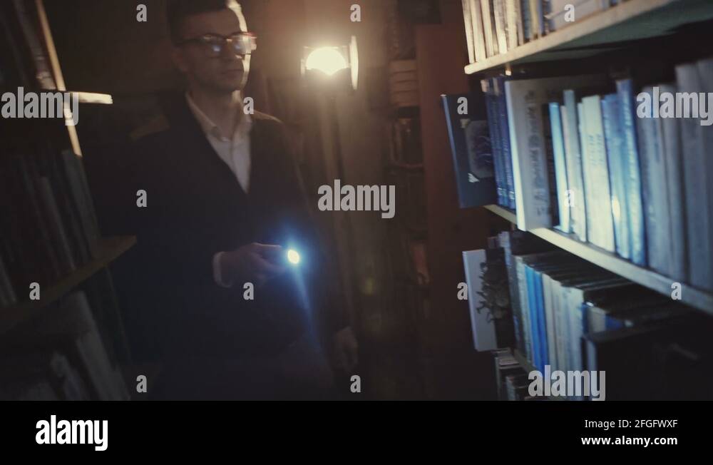 Man shining torch Stock Videos & Footage - HD and 4K Video Clips - Alamy