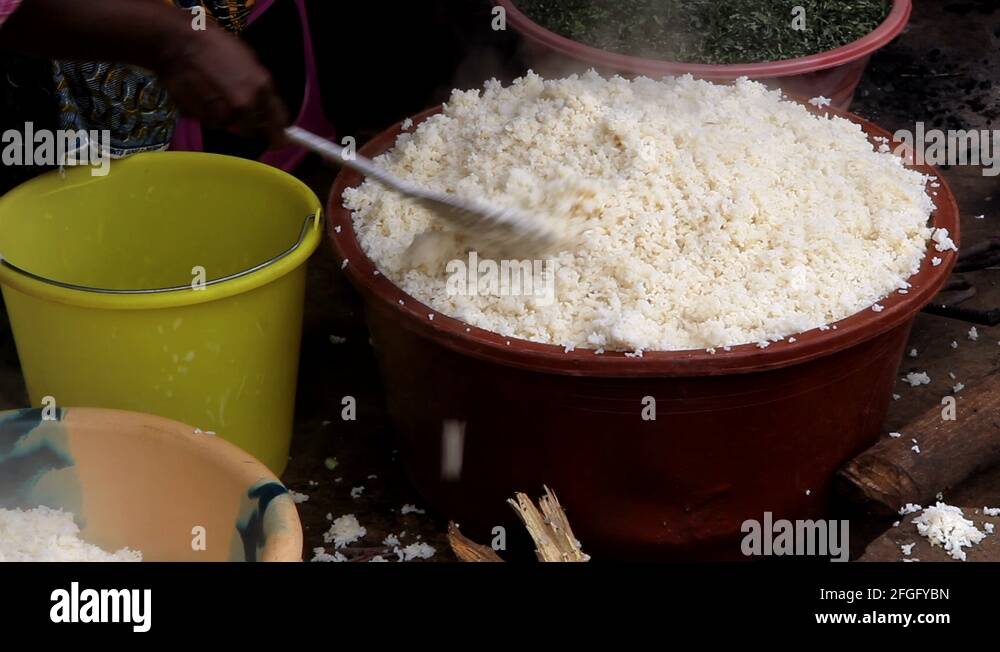 Woman cooking rice Stock Videos & Footage - HD and 4K Video Clips - Alamy