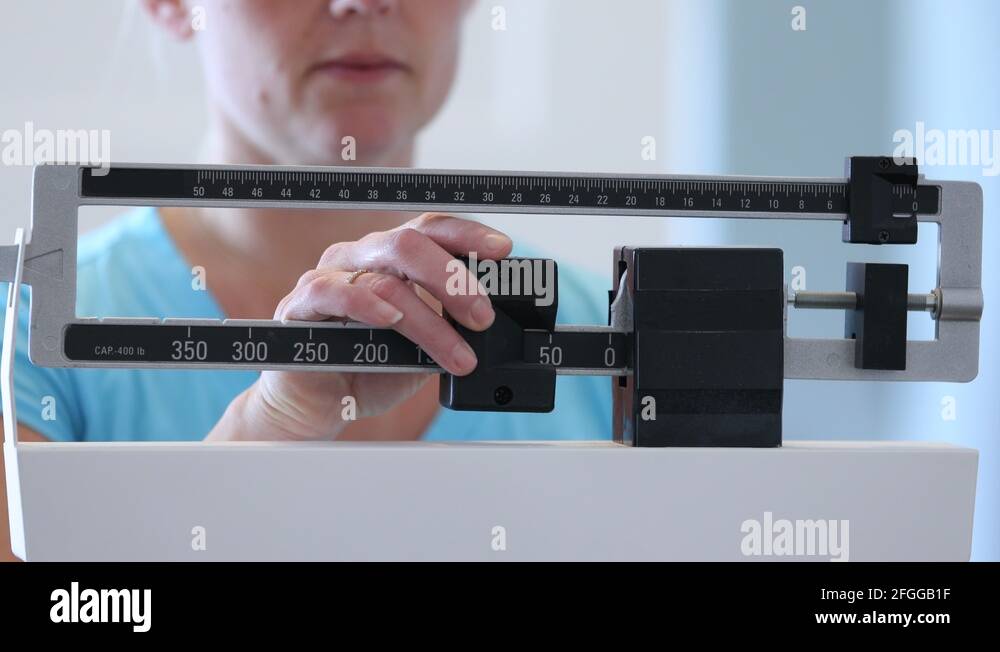 Weighing herself scale Stock Videos & Footage - HD and 4K Video Clips ...