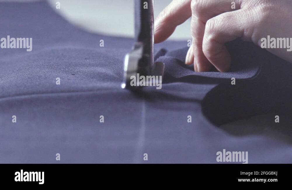 Cutting fabric. Blue cut out fabric for clothing in a textile factory ...