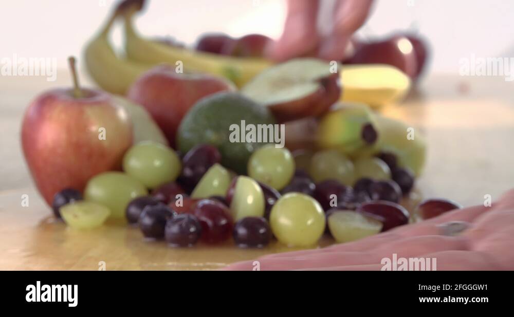 Grabbing fruit Stock Videos & Footage - HD and 4K Video Clips - Alamy