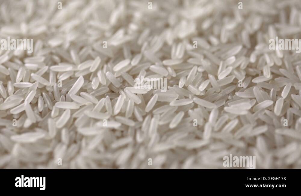 Rotating dry uncooked rice. Spinning closeup seeds Stock Video Footage ...