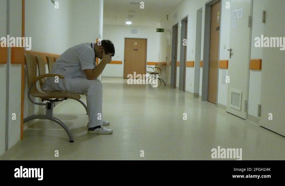 Sitting sad hospital Stock Videos & Footage - HD and 4K Video Clips - Alamy