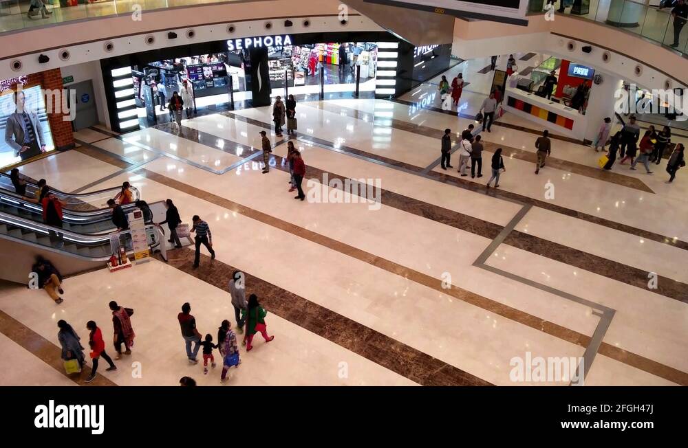 People roaming in a shopping mall in India Stock Video Footage - Alamy