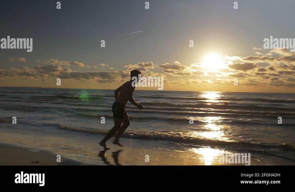 Jogging barefoot beach man Stock Videos & Footage - HD and 4K Video ...
