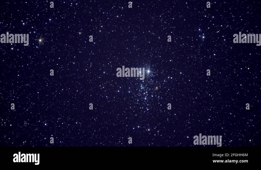 Zoom in on a star cluster in space that resumbles an owl Stock Video ...