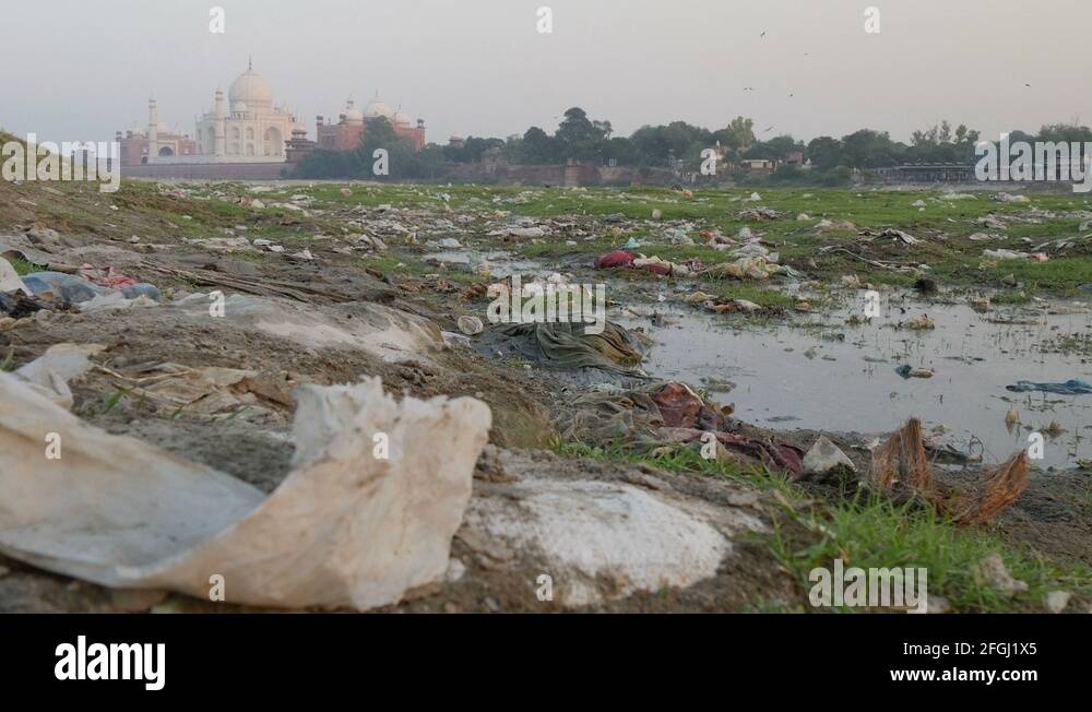 Heavily polluted river in front of the iconic Taj Mahal building in ...