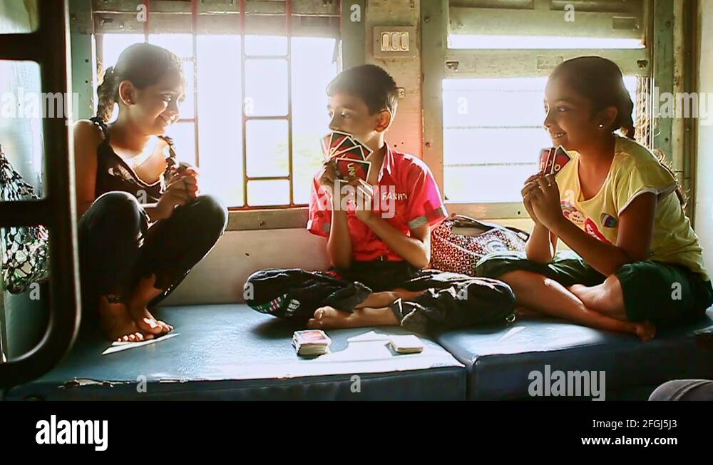 Indian Children Play Cards Laugh in Moving Train Carriage Stock Video ...