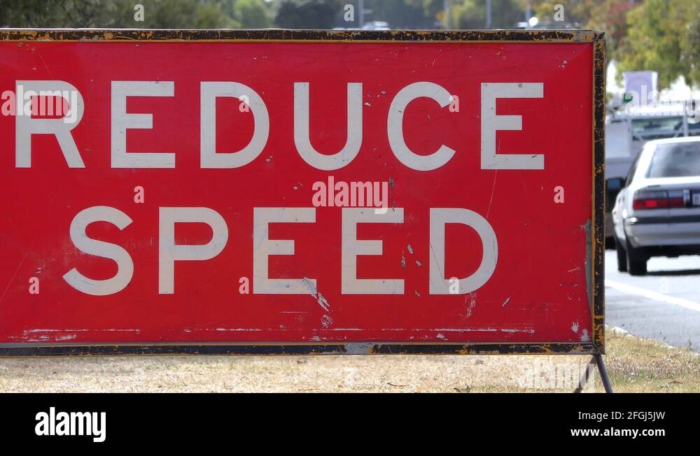 Reduce speed ahead sign Stock Videos & Footage - HD and 4K Video Clips ...