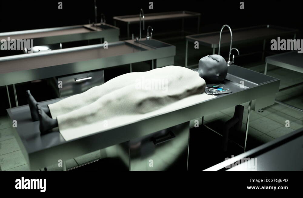 The dead alien in the morgue on the table. Futuristic autopsy concept ...