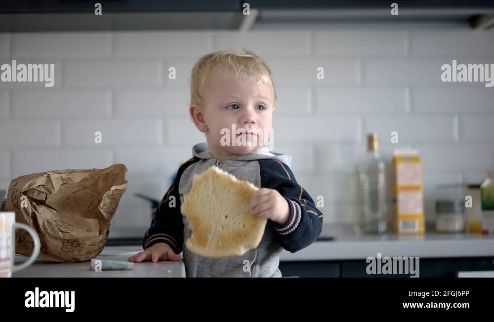 Boy bread Stock Videos & Footage - HD and 4K Video Clips - Alamy