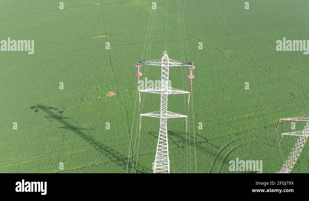 Power transmission lines pylons crossing Stock Videos & Footage - HD ...