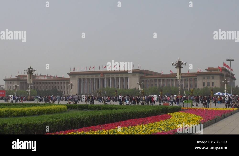 Tourist people visit Tiananmen Square and Great Hall building in ...