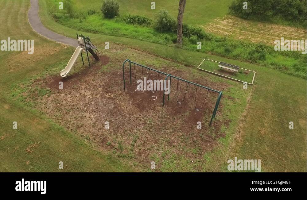 Playground at park with swings and slide aerial view Stock Video ...