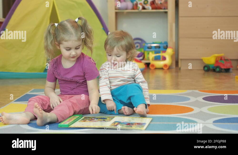 Little Boy and Girl Reading a Book. Children Kid and Baby Play. Brother ...