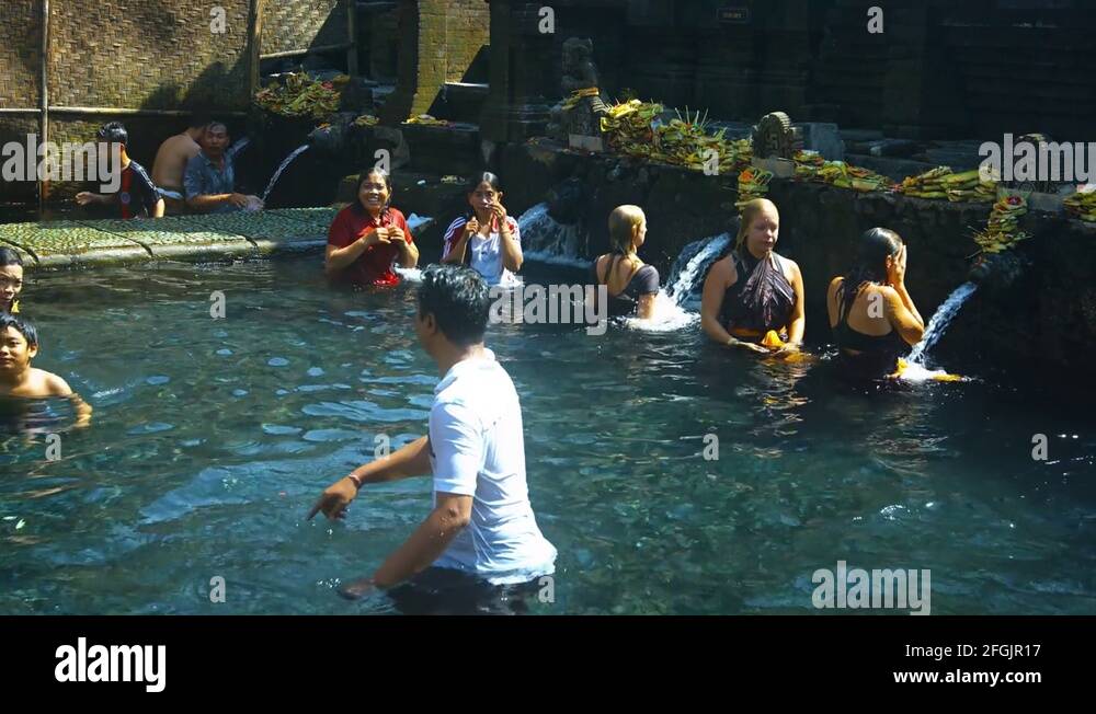 Women take bath at Holy Spring Water Tirta Empul Hindu Temple. Bali ...
