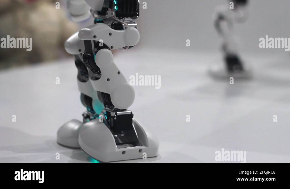 Robotic legs dancing. Humanoid robot feet dance. Robotic technology ...