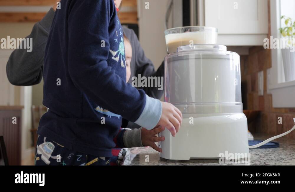 Little boys making ice cream with their mother Stock Video Footage - Alamy