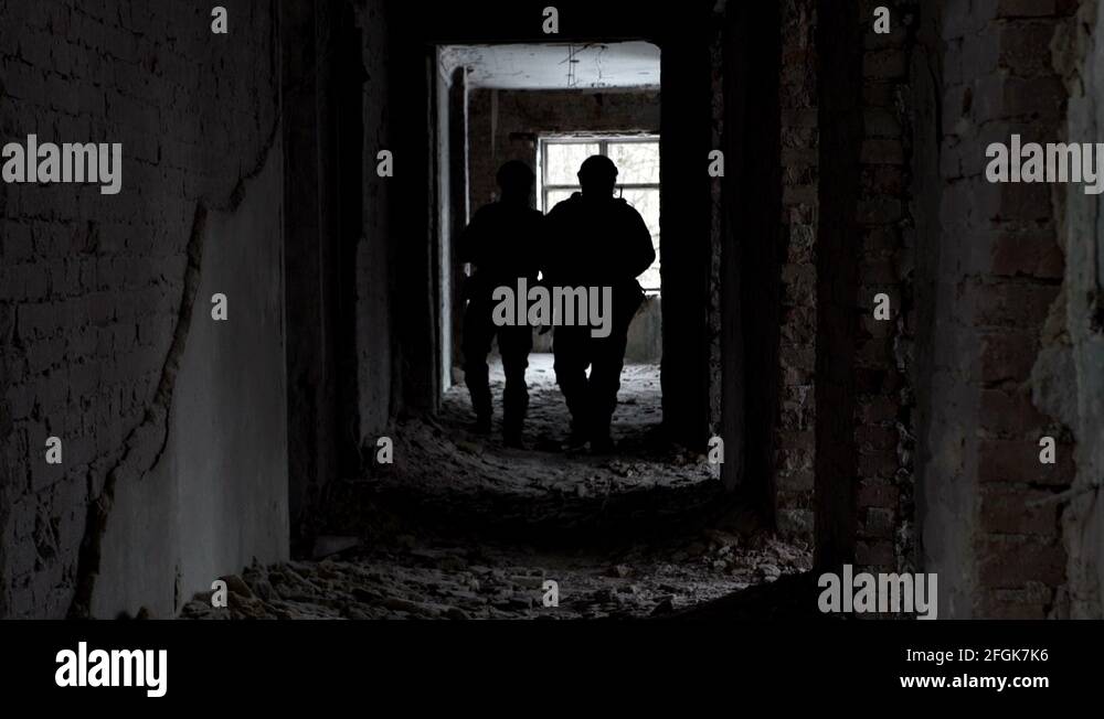 Military men with arms defending the building Stock Video Footage - Alamy