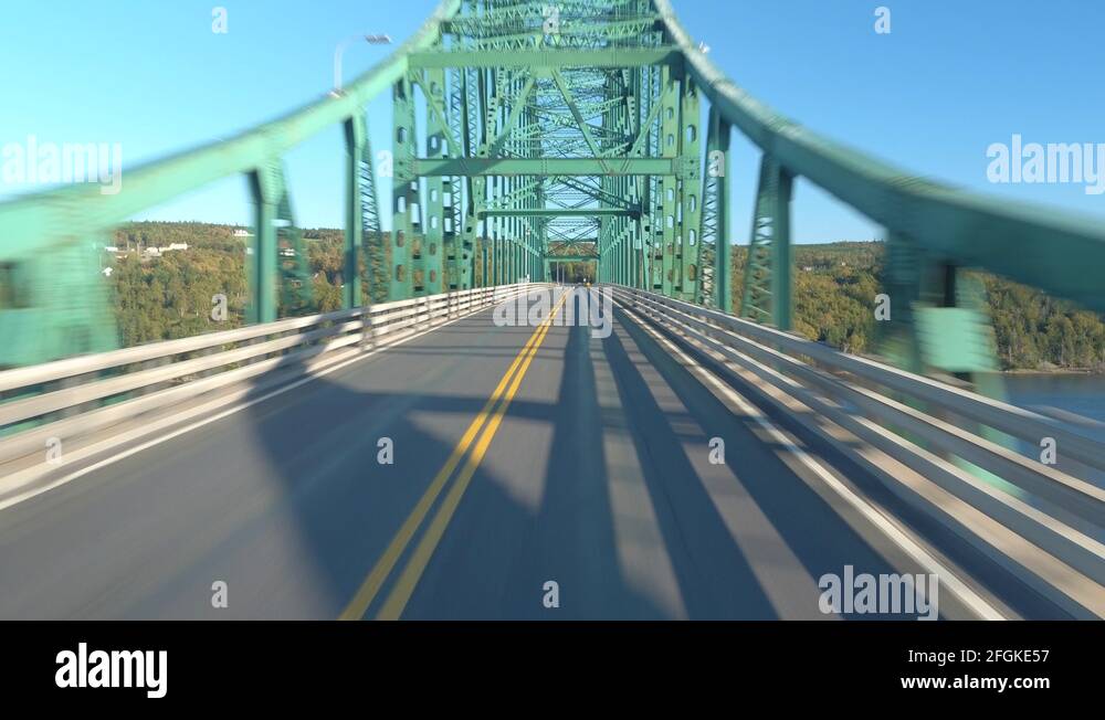 FPV, CLOSE UP: Crossing the Seal Island Bridge over the Great Bras D'Or ...