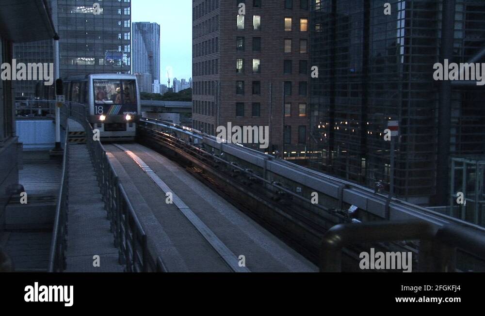 Monorail station in Tokyo, Japan. Train arriving. Transport system ...
