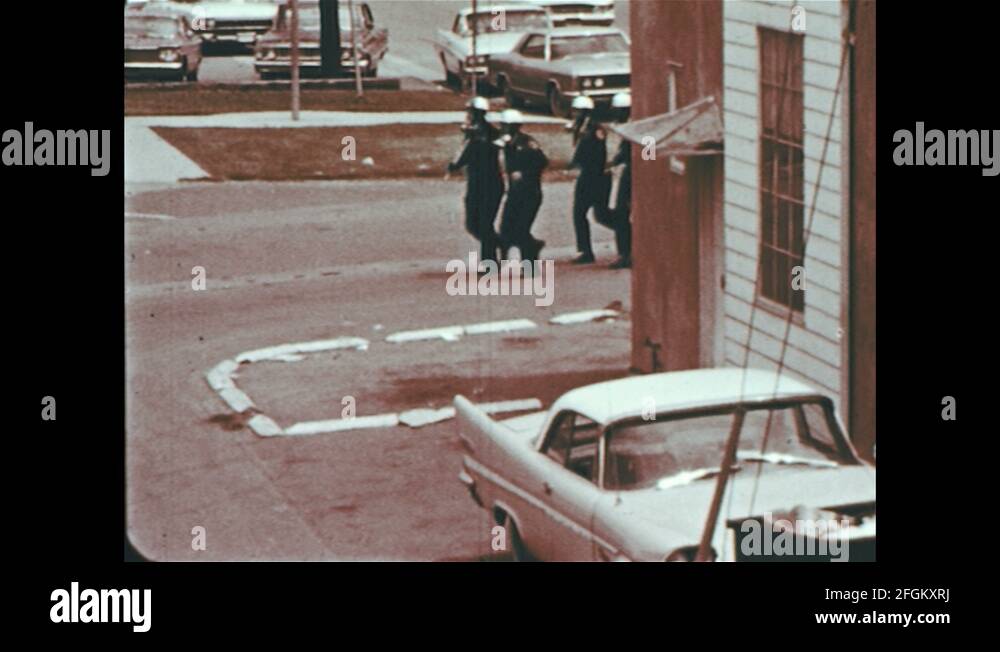 1960s: A discipline police unit arrives at the scene of disturbance ...