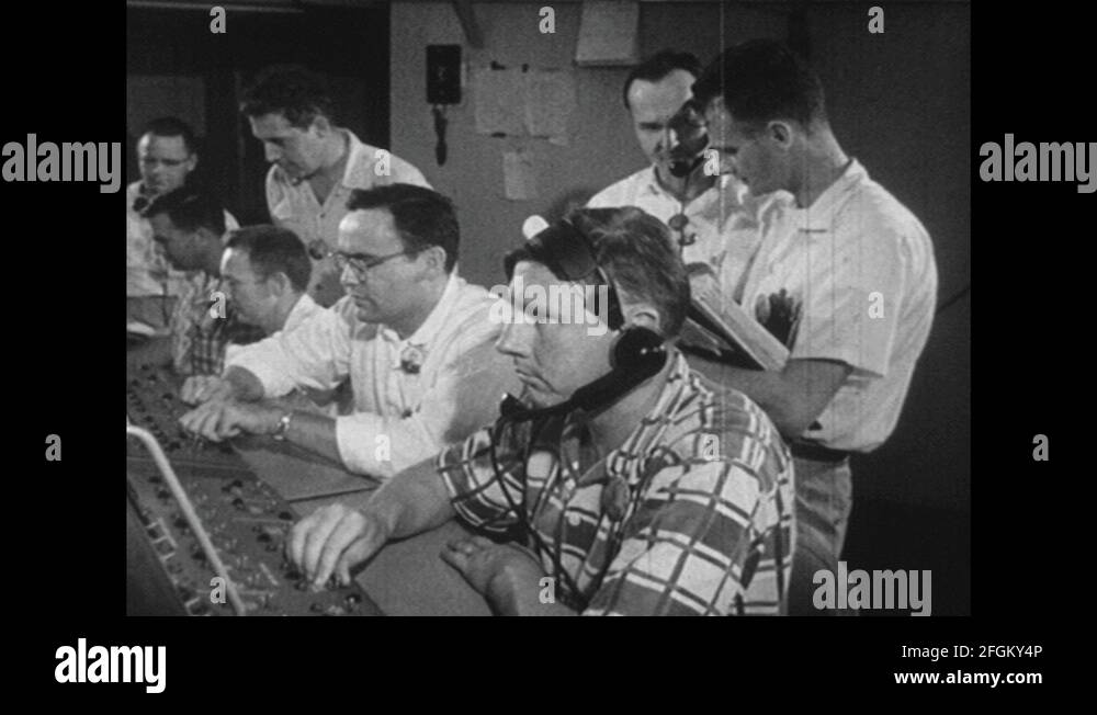 1950s: Control room staff are focused on the time before they press the ...