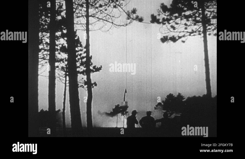 1940s: A rocket successfully launches and opens fire in a town Stock ...