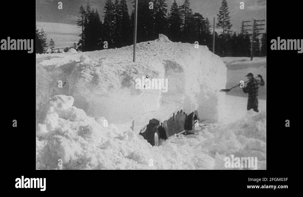 1952 : People shovel through almost 10 feet of snow as a postal worker ...