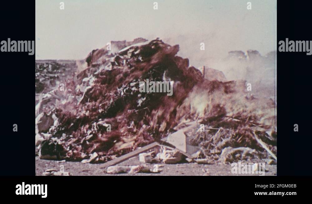 1970s – A mound of trash is burned to create space in a landfill Stock ...