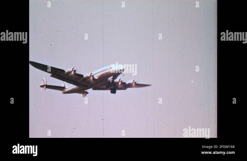 1950s: Plane flies overhead / Underside of plane, smaller plane / Plane ...