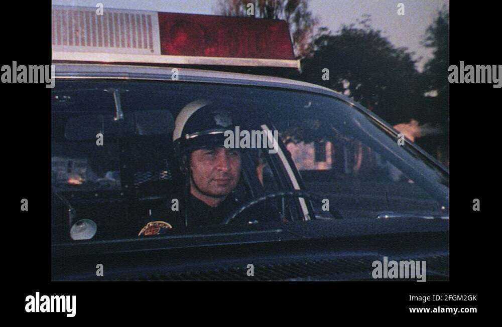 Female police officer with police car Stock Videos & Footage - HD and ...