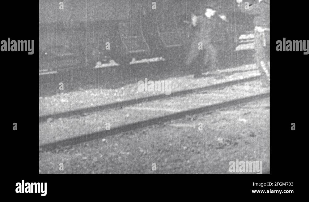 1900s: People walking off train/ Woman guided to stairs Stock Video ...