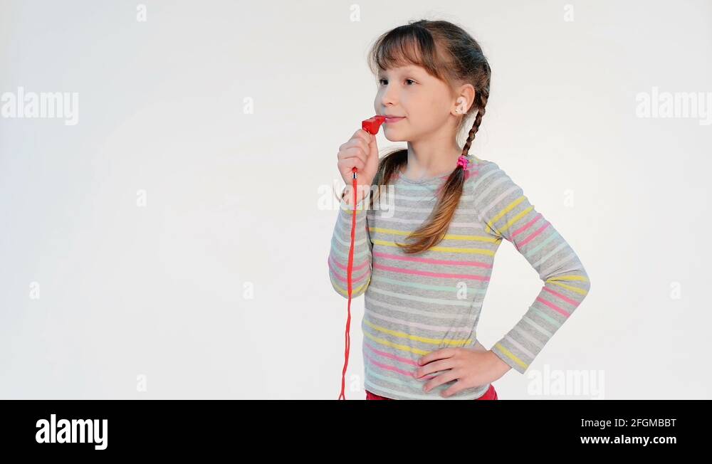 Girl whistle blowing Stock Videos & Footage - HD and 4K Video Clips - Alamy