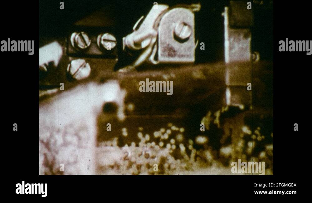 1960s: Views of computer parts moving, radar screens / Dissolve, zoom ...