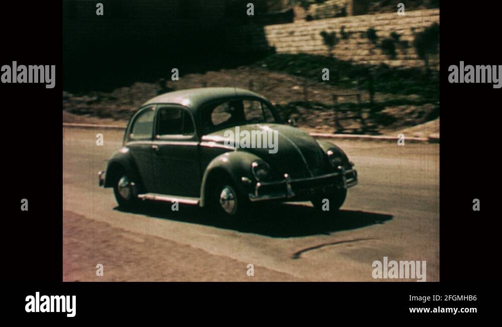 NAZARETH, ISRAEL: 1960s: VW car drives through street in Nazareth Stock ...