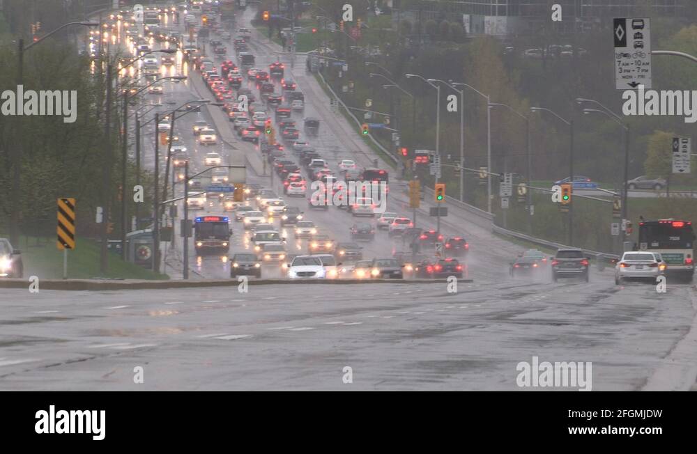 Traffic jam and gridlock on the highway in rain across Toronto Stock ...