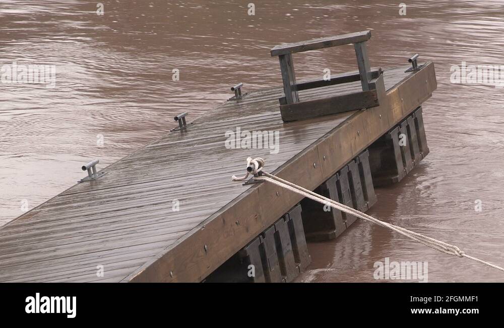 Docks damaged during flooding and high lake Ontario water levels Stock ...
