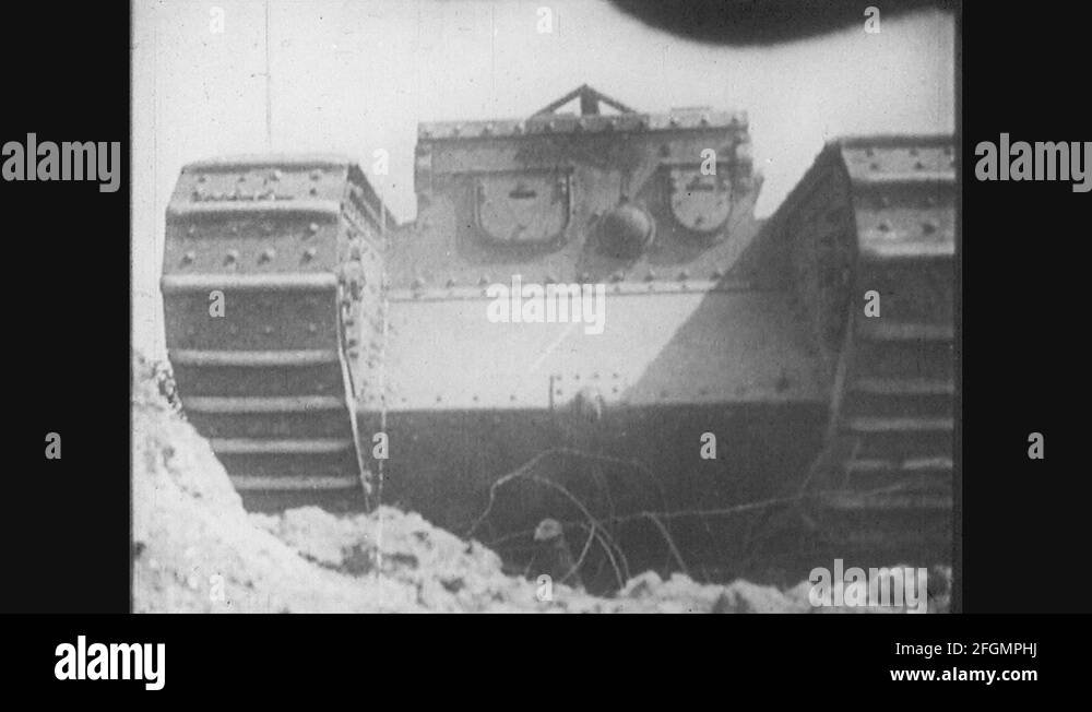 UNITED STATES: 1910s: view from under tank. Machine gun fires on ...