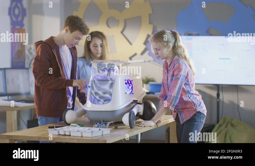 Two Girls and a Boy Turn On Fully Functional Programmed Robot with ...