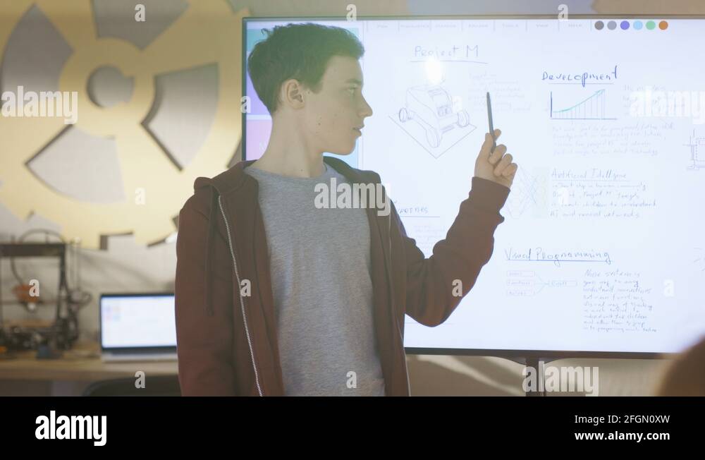 Boy Shows to the Class His Presentation on Interactive Whiteboard Stock ...