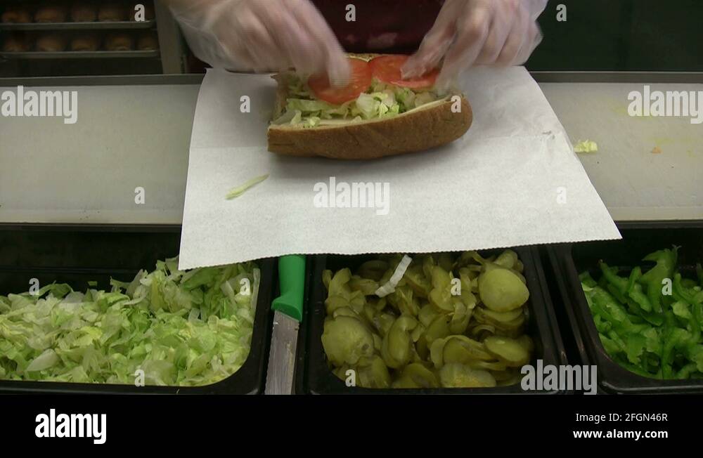 Preparing fast food sandwich in fast food restaurant Stock Video ...