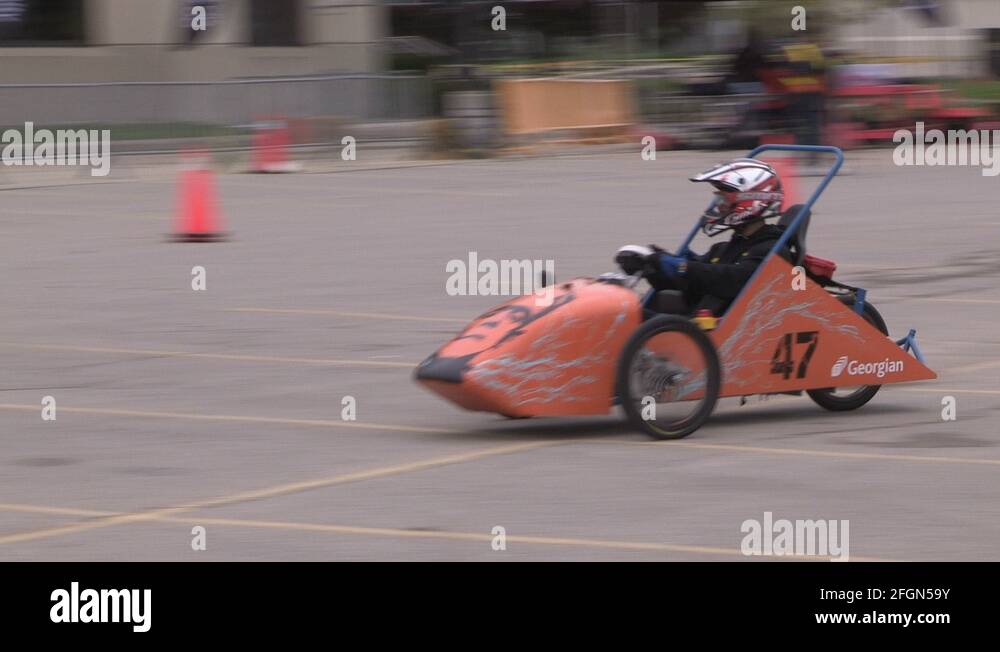 Students race electric cars on college campus in battery powered ...
